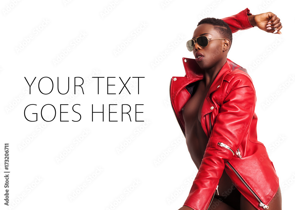 Gorgeous african model wearing red jacket and sunglasses while posing ...