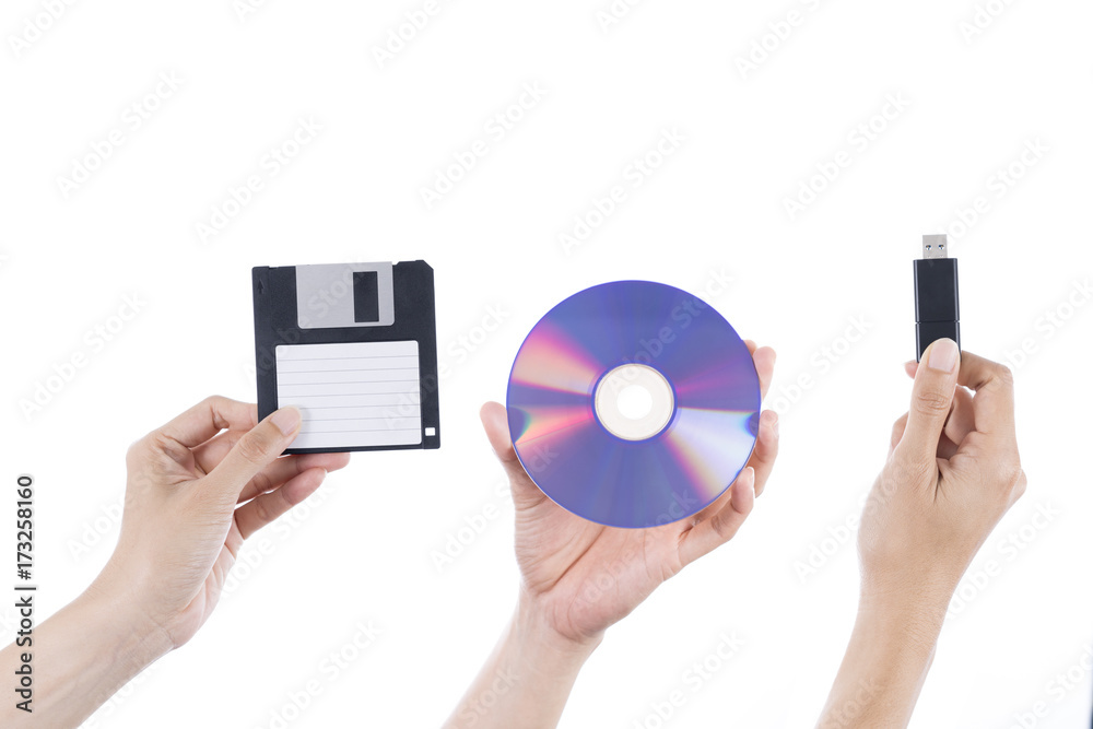 Floppy disk, CD or DVD disc and flash/ thumb drive comparision concept ...