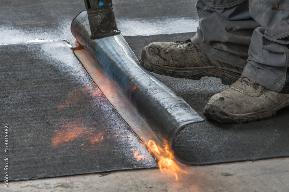 Professional installation of the waterproofing on the concrete ...