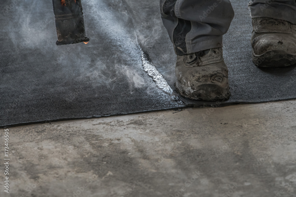 Professional installation of the waterproofing on the concrete ...