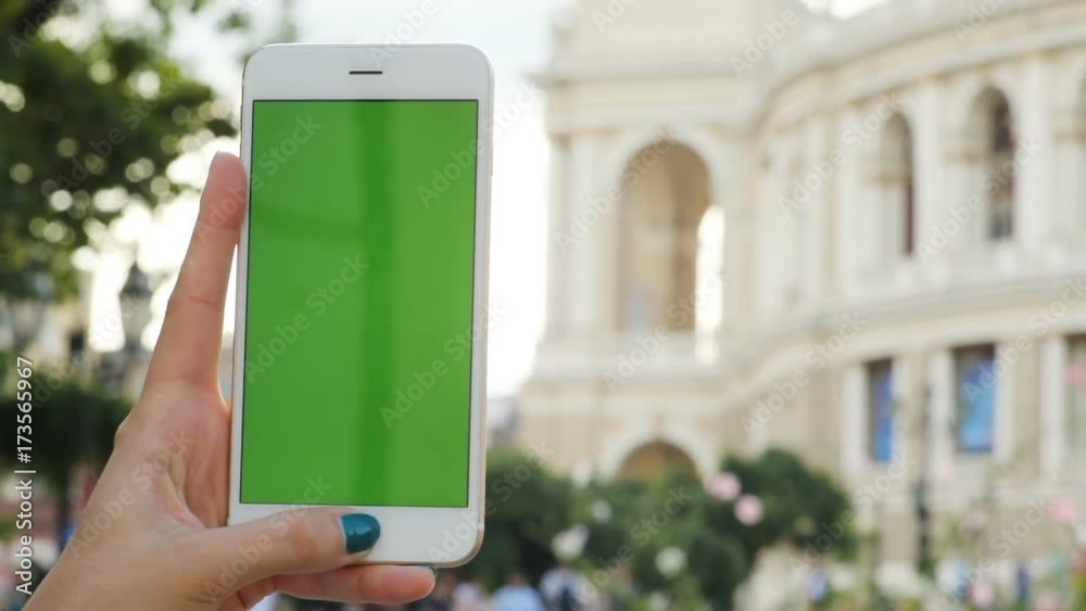 Closeup female woman hand holding vertical white smart phone mobile ...