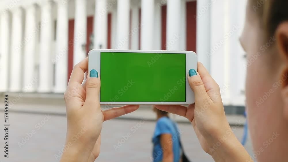 Closeup woman girl hands holding horizontal white smart phone mobile ...