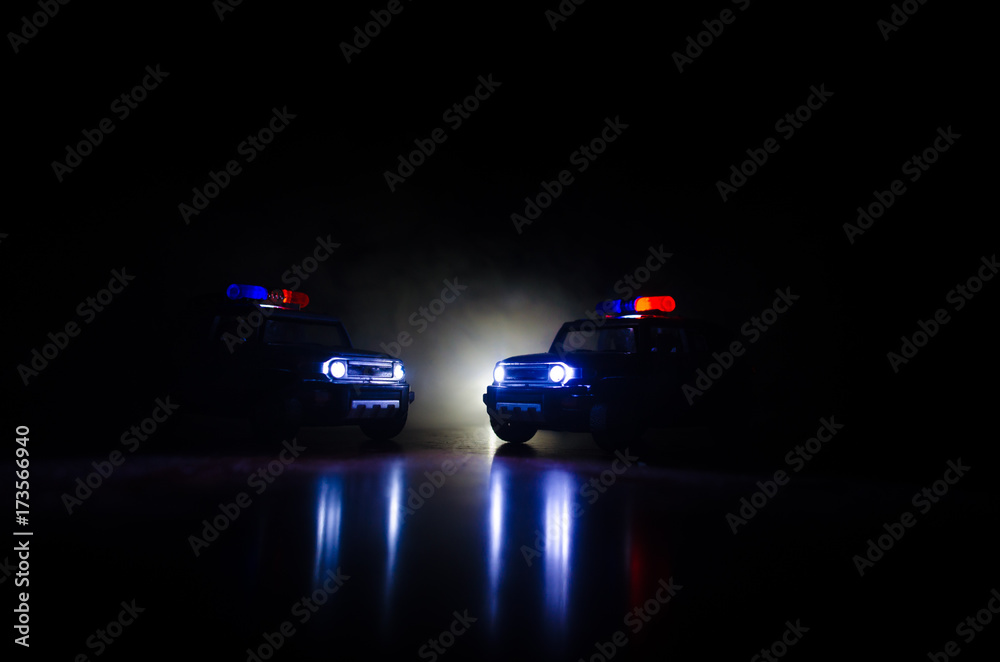 Police car chasing a car at night with fog background. 911 Emergency ...