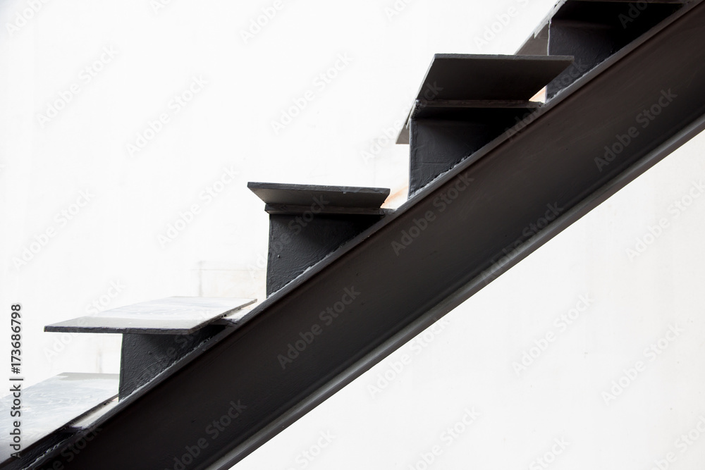 Installation of steel stairs using steel i-beams. Stock Photo | Adobe Stock