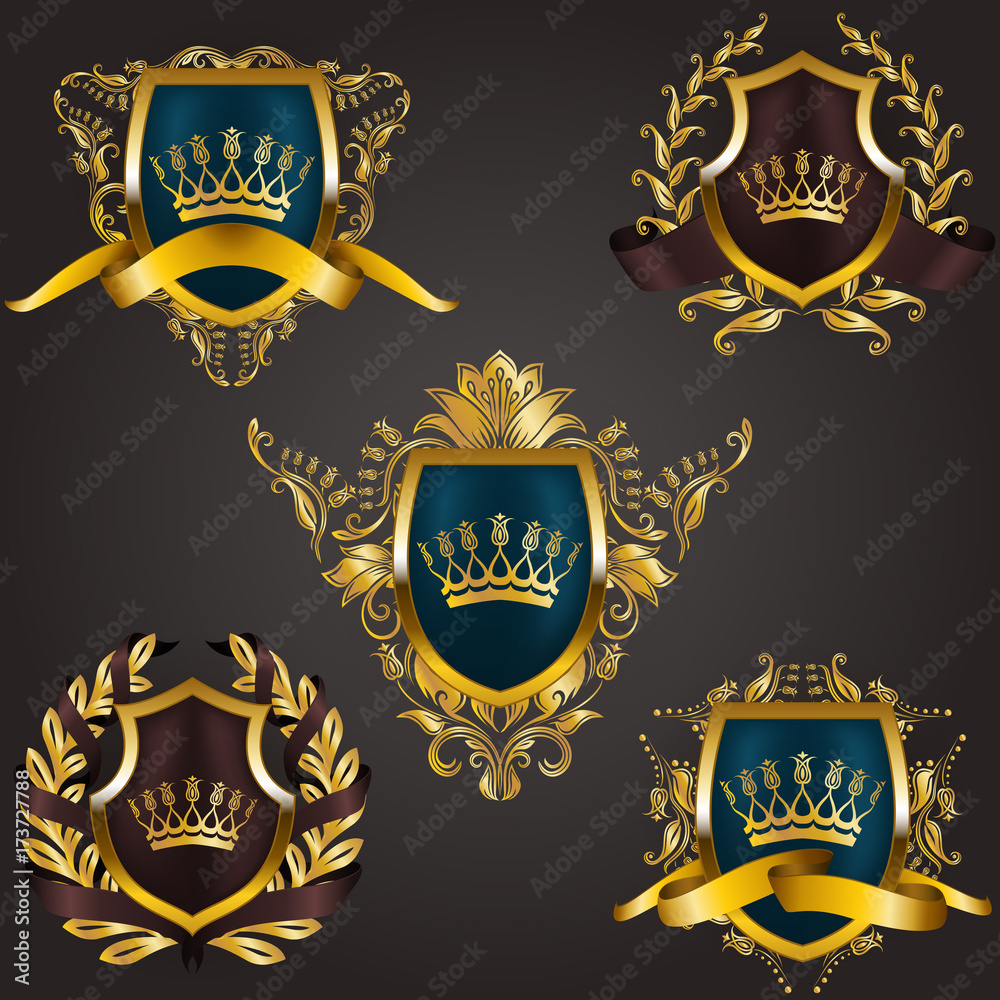 Set of golden royal shields with floral elements, ribbons, laurel ...