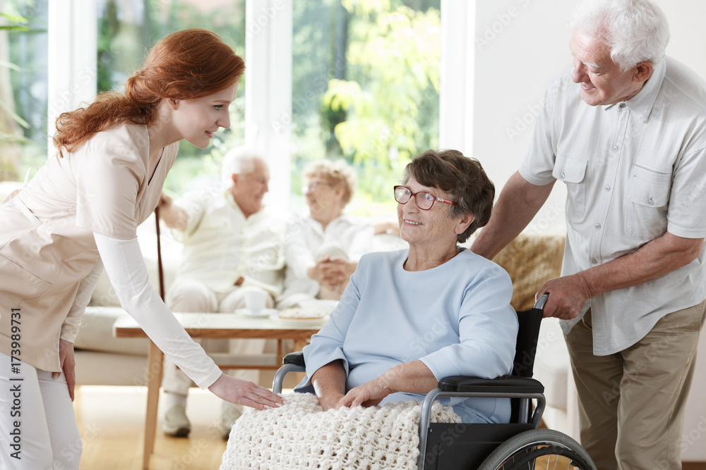 Nurse saying goodbye to patient Stock Photo | Adobe Stock