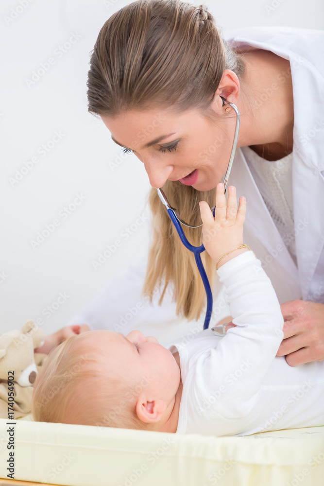 Female Pediatrician With Baby