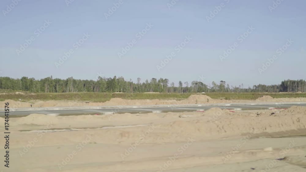 Construction, concreting of airport runways, roads. Men, workers ...