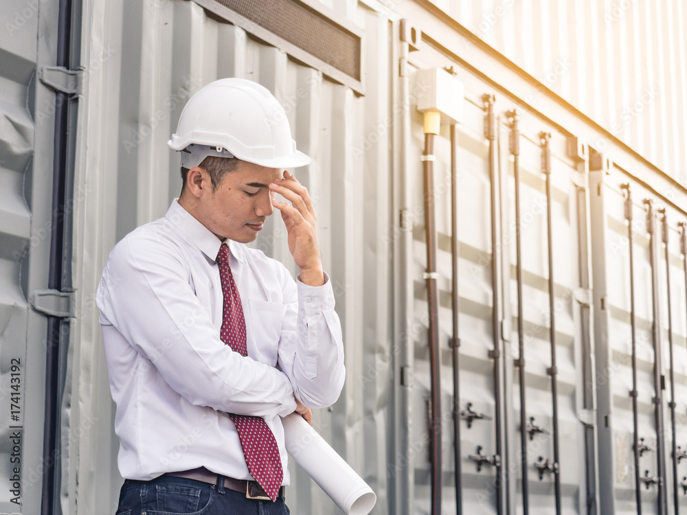 Exhausted/tired/sad/disappointed/frustrated young asian engineer ...