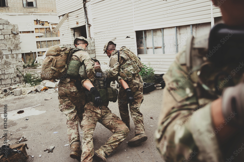 special forces soldiers with weapons during the rescue operation. war ...