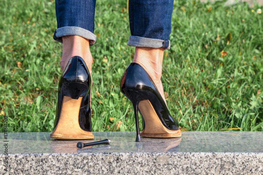 broken stiletto heel on the shoes wearing on your feet girls Stock ...