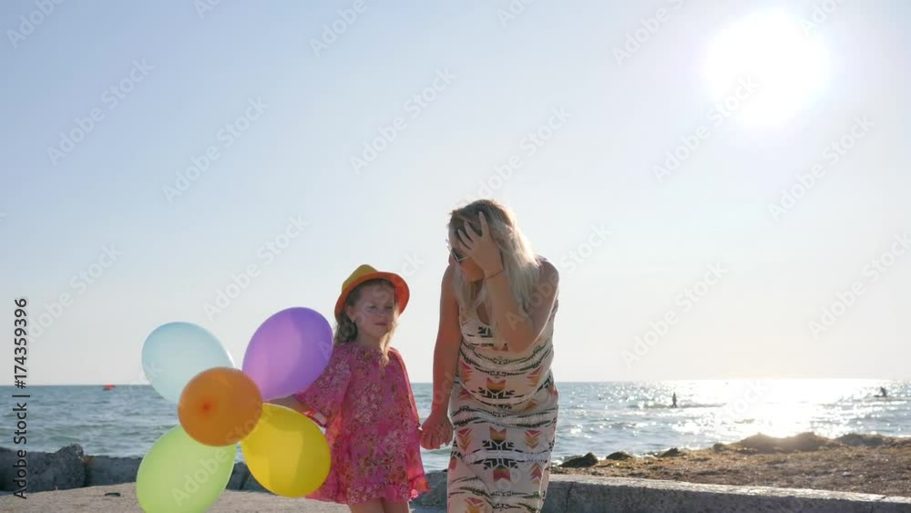 Vidéo Stock cripple in wheelchair with family, mother goes for hand ...