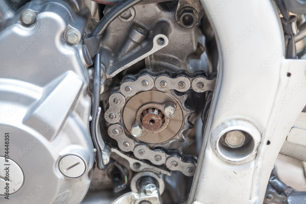 gear wheel with chain of motorcycle wheel. Stock Photo | Adobe Stock