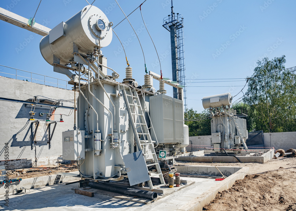 High-voltage substation on blue sky background with switch Stock Photo ...