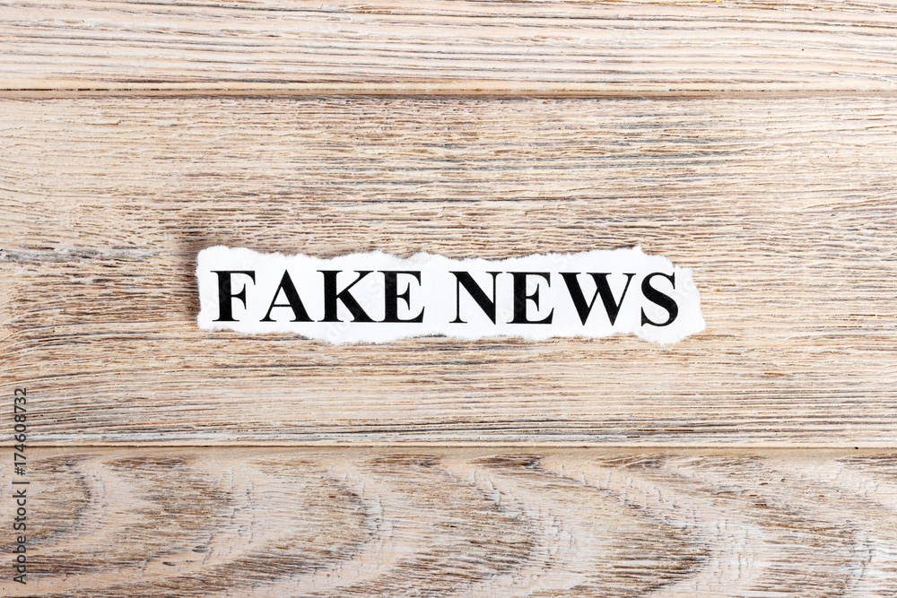 FAKE NEWS text on paper. Word FAKE NEWS on torn paper. Concept Image ...
