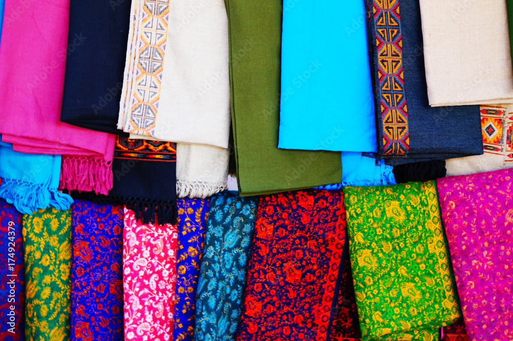 Colorful sari, traditional indian clothes and scarfes. Anjuna flea ...