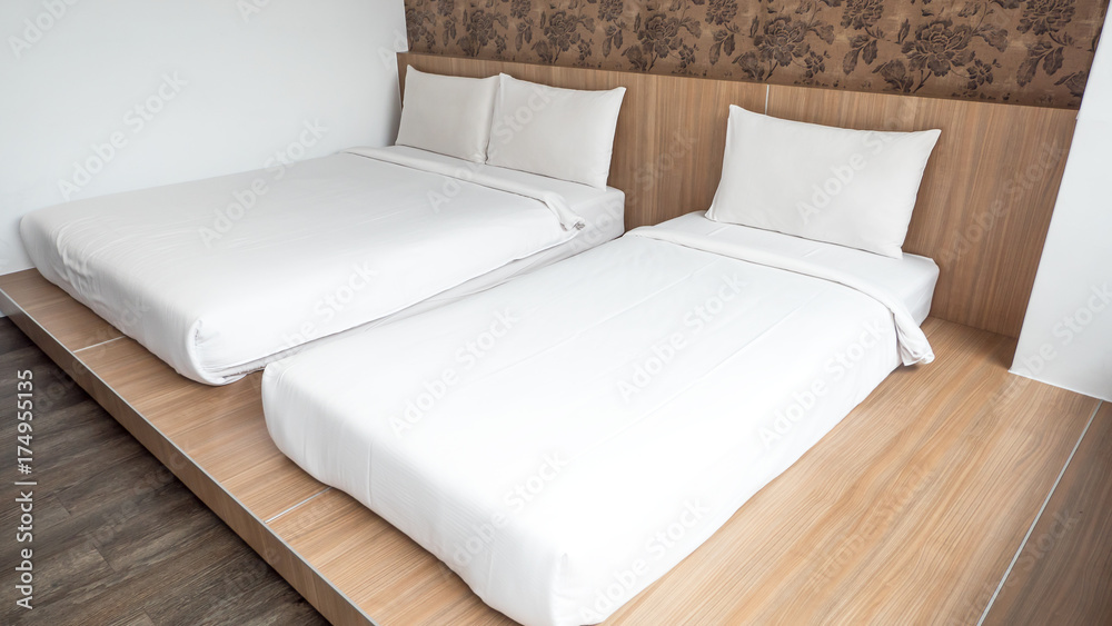 Bedroom with white triple beds 1 Stock Photo | Adobe Stock