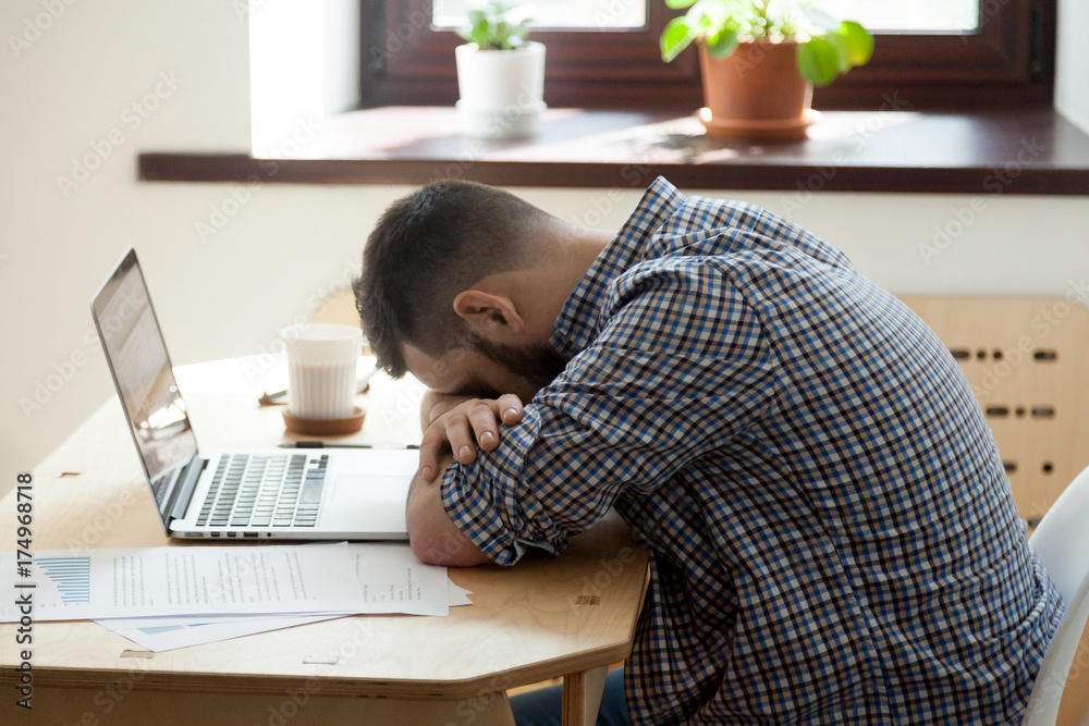 Person Sleeping At Desk