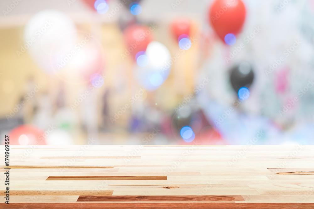 Empty wooden table with party in wedding background blurred. Stock ...