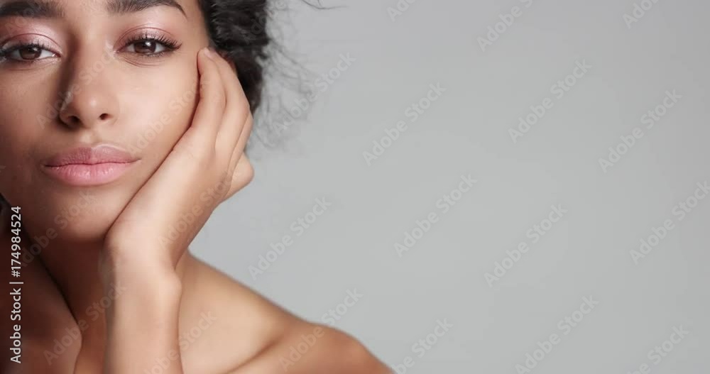 Smiling attractive Moroccan young woman with flawless light brown skin ... Smiling attractive Moroccan young woman with flawless light brown skin ...