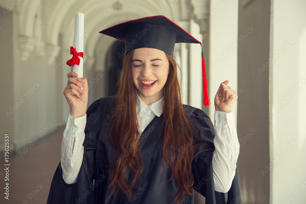 Very happy woman on her graduation day University. Woman student in ...