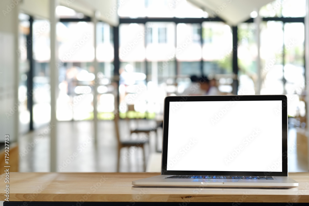 Mock up Blank screen Laptop on wood table in Co-working or cafe. Blank ...