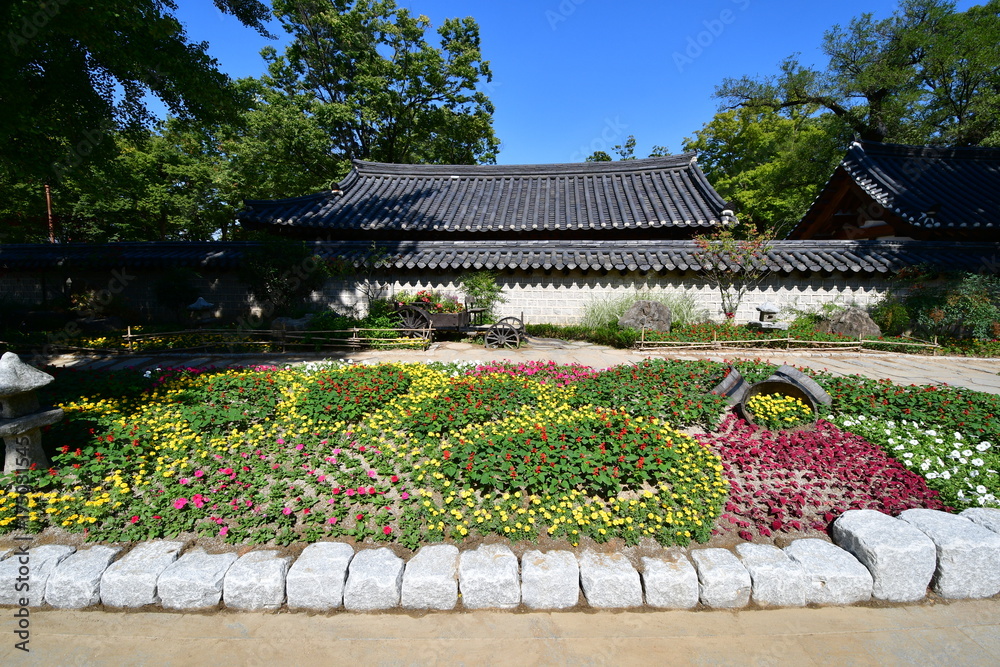 Stone road and flower garden at Gyeonggijeon Hall in Jeonju Korean ...