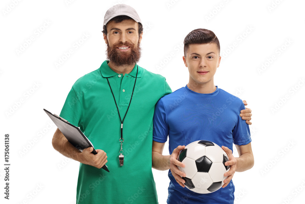 Soccer coach and a teenage player with a football Stock Photo | Adobe Stock