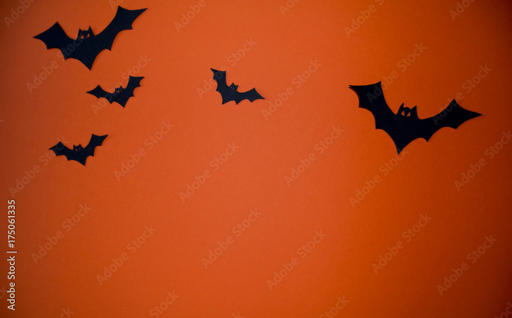 Silhouettes of bats. Swarm of bats on the orange background. Background ...