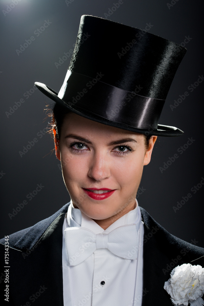 Glamorous vintage style portrait of beautiful young woman wearing top ...