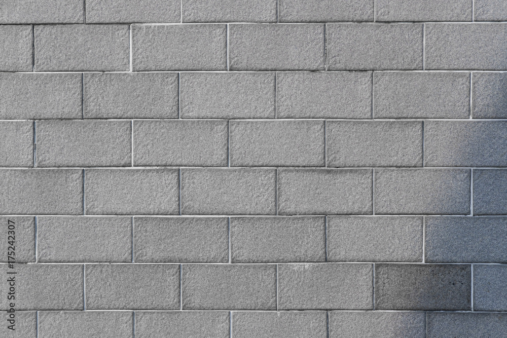 Concrete block wall background in gray color with shadow, block wall ...