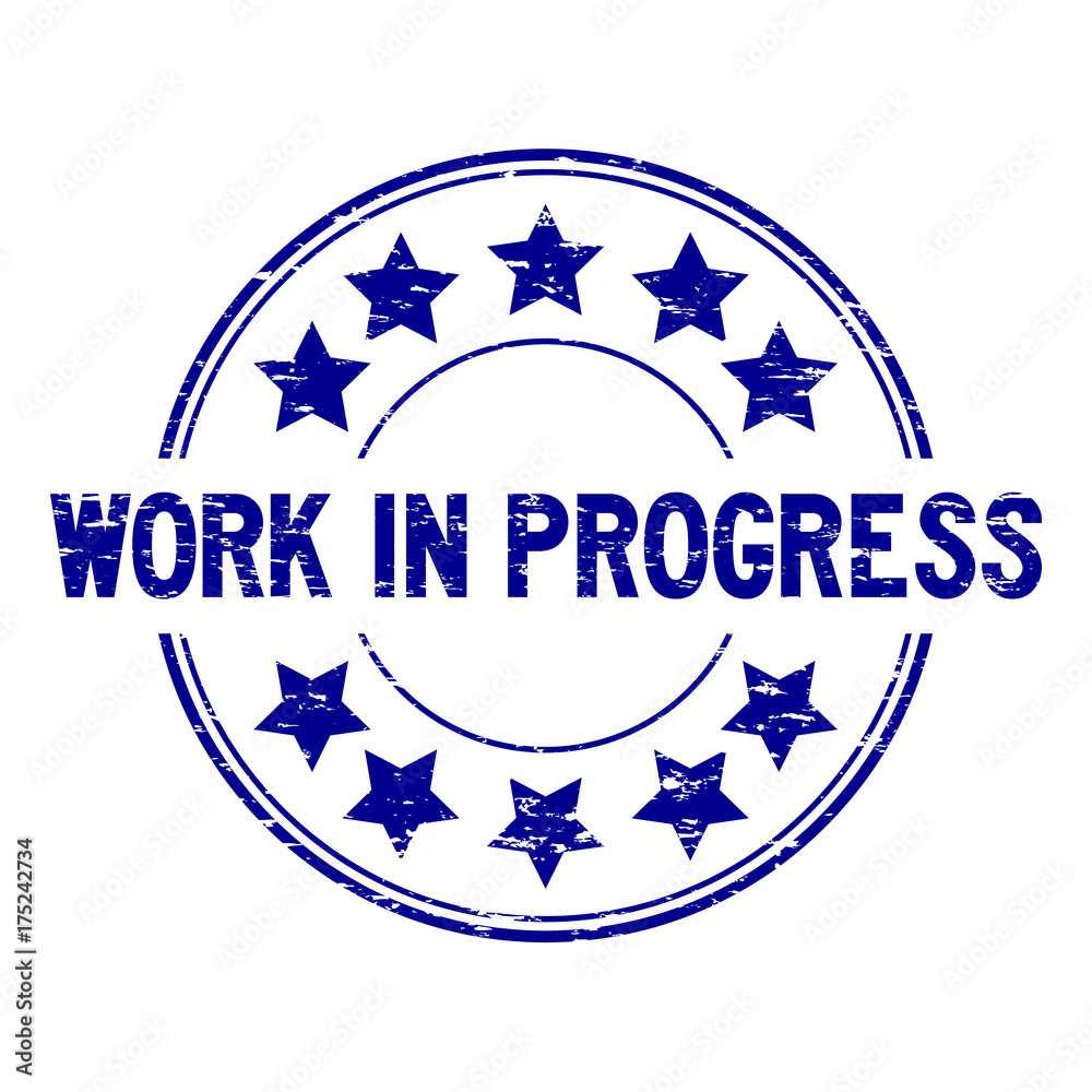 Grunge blue work in process with star icon round rubber seal stamp on ...