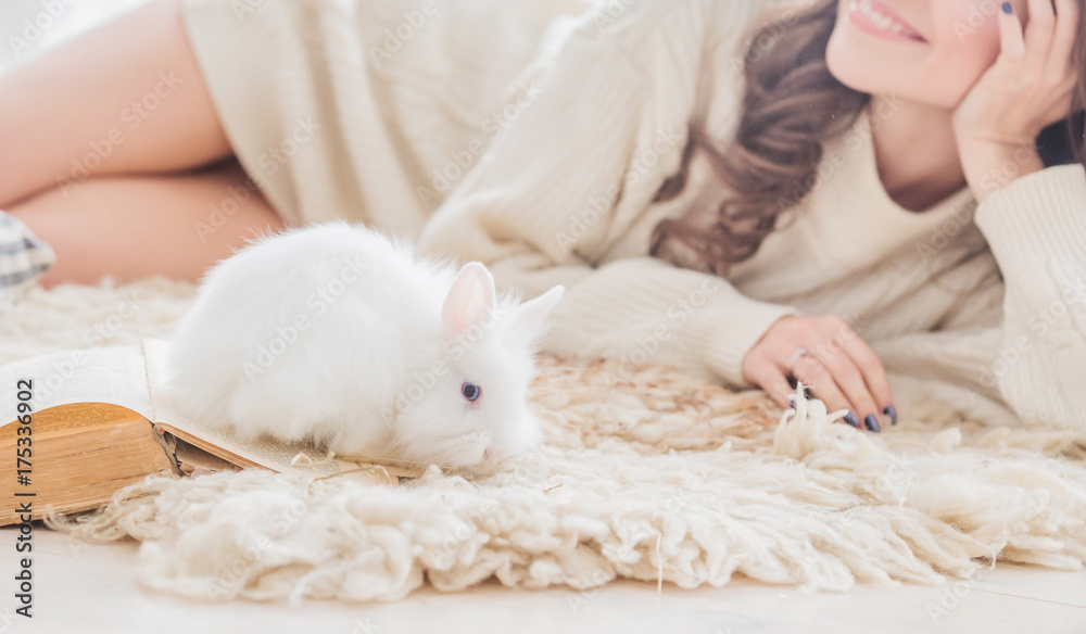 women with rabbit Stock Photo | Adobe Stock