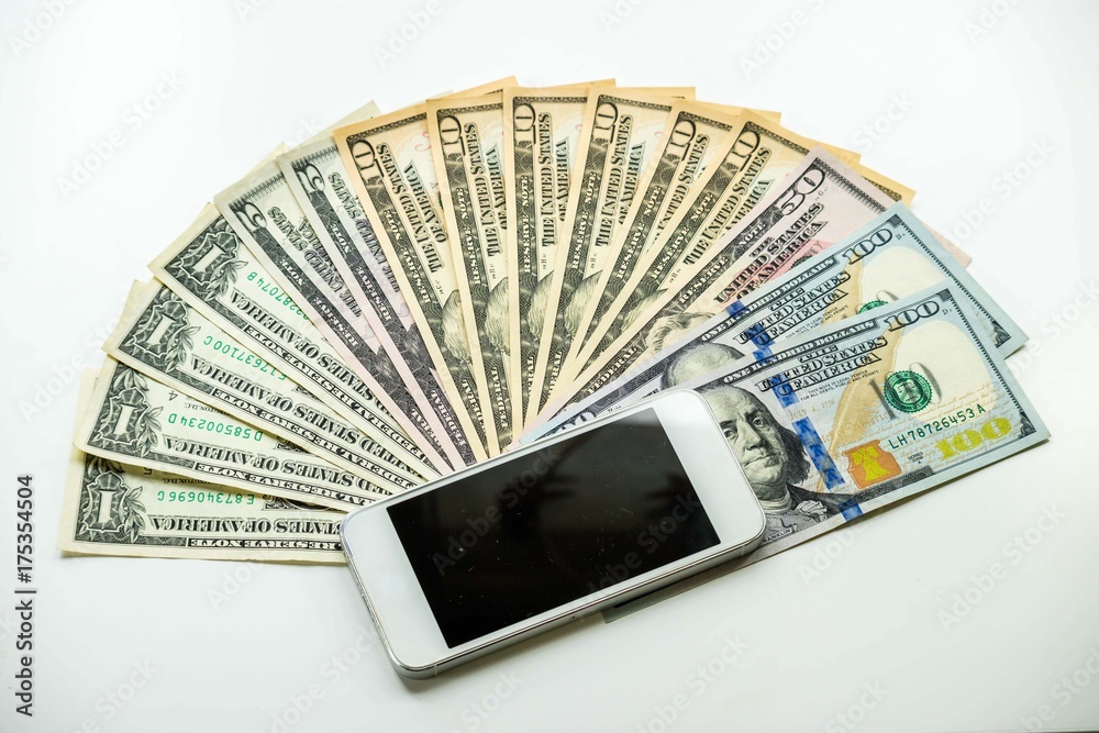 Mobile smartphone on US dollar banknote, digital money concept Stock ...