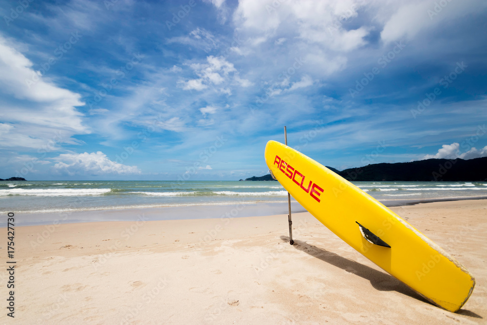 lifeguard surf rescue surfboard on the beach at rescue guard point with ...