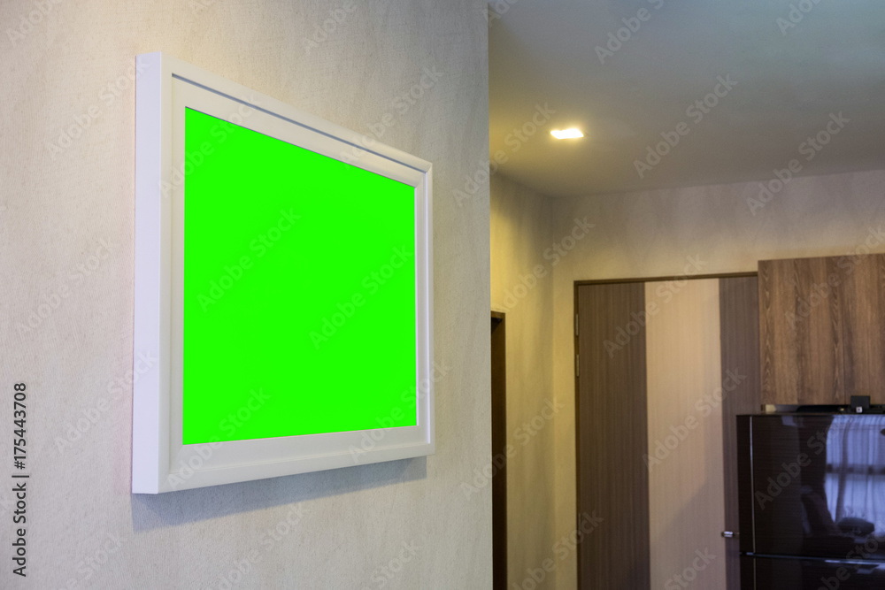 Decorative photo frame on wall with green screen empty a frame. Stock ...