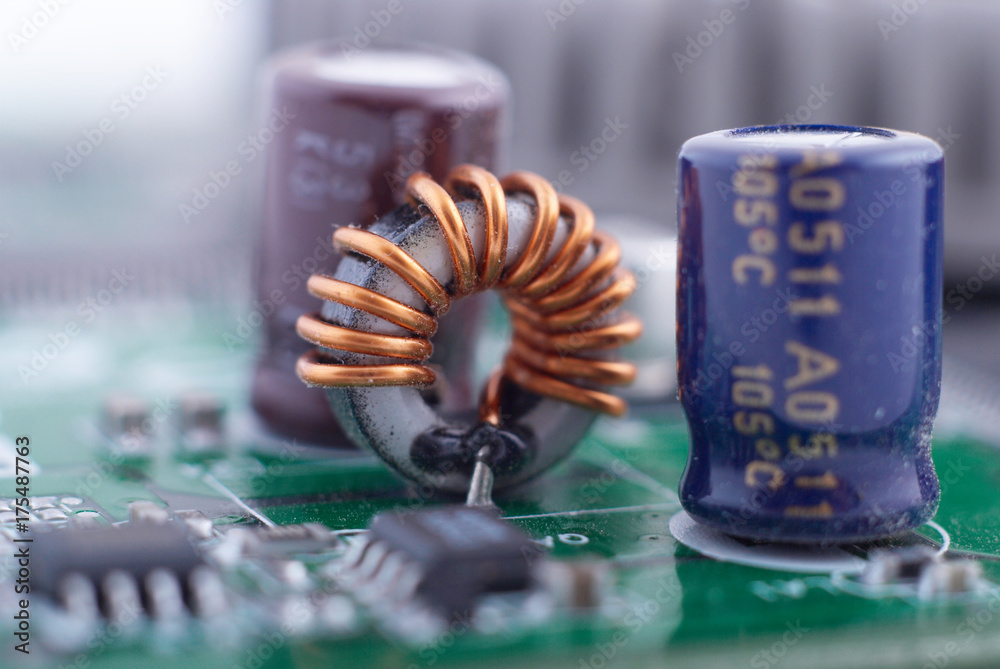 inductor with motherboard background. Computer board chip circuit ...
