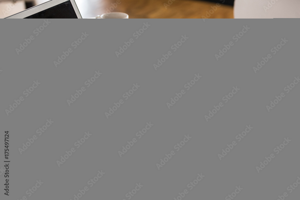Laptop, bar chart and smartphone on office desk Stock Photo | Adobe Stock