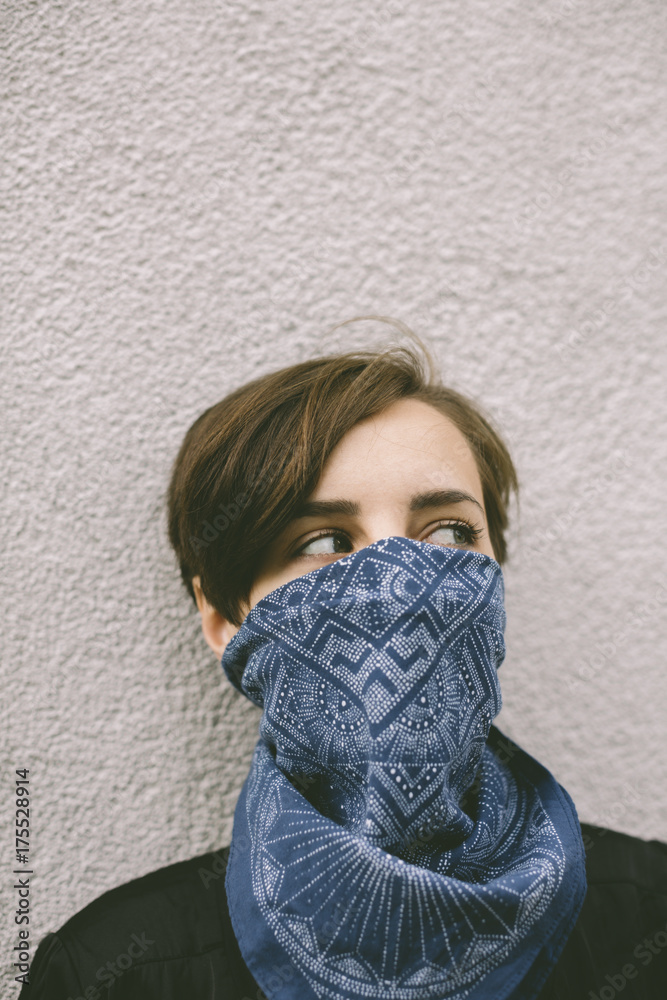 tomboy covered face with blue headscarf Stock Photo | Adobe Stock