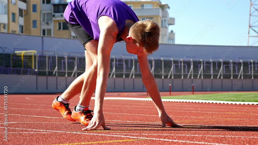 Track runner boy teenager at starting line, 4k Stock Video | Adobe Stock