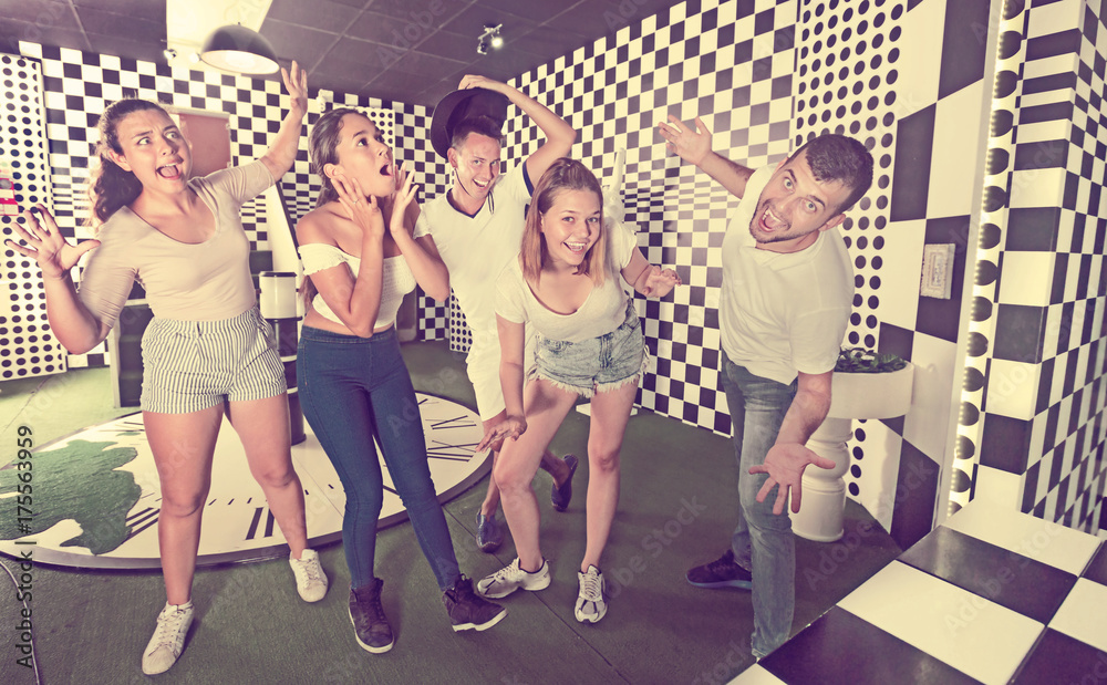 Young people having fun in escape room Stock Photo | Adobe Stock