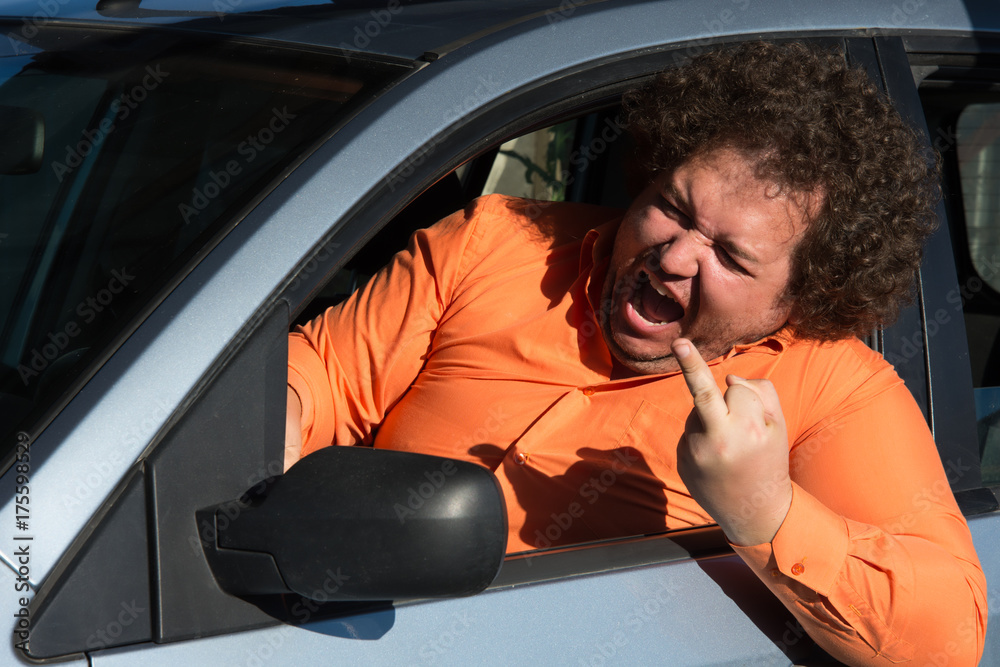Foto Stock Funny man in the car. | Adobe Stock
