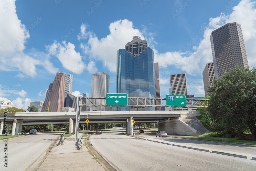 Downtown Houston from Allen Parkway near Sabine street under cloud blue ...