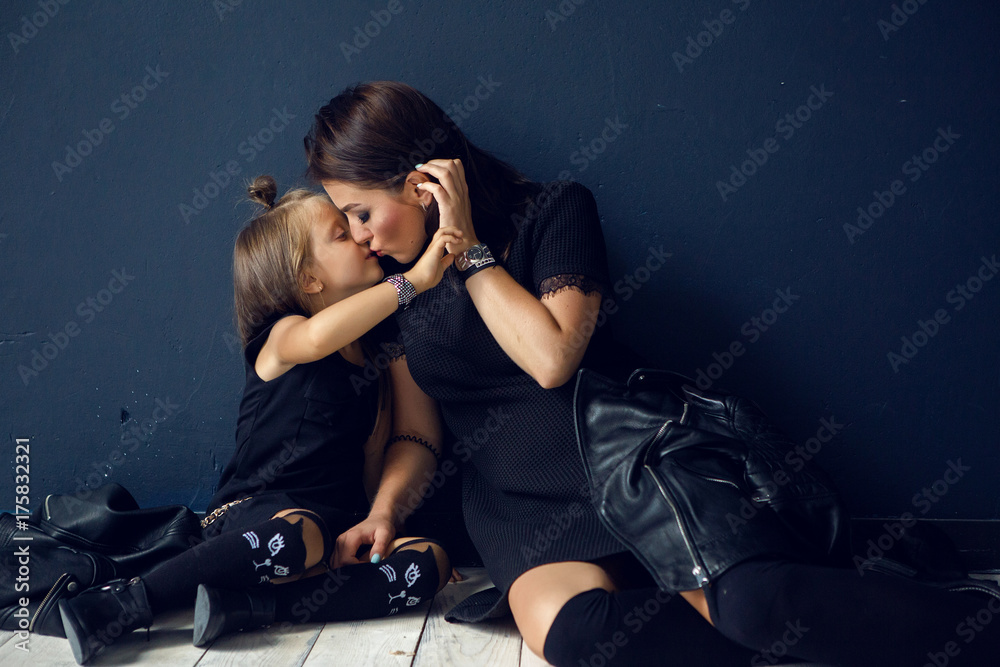 girl with long hair in black leather jacket Stock Photo | Adobe Stock