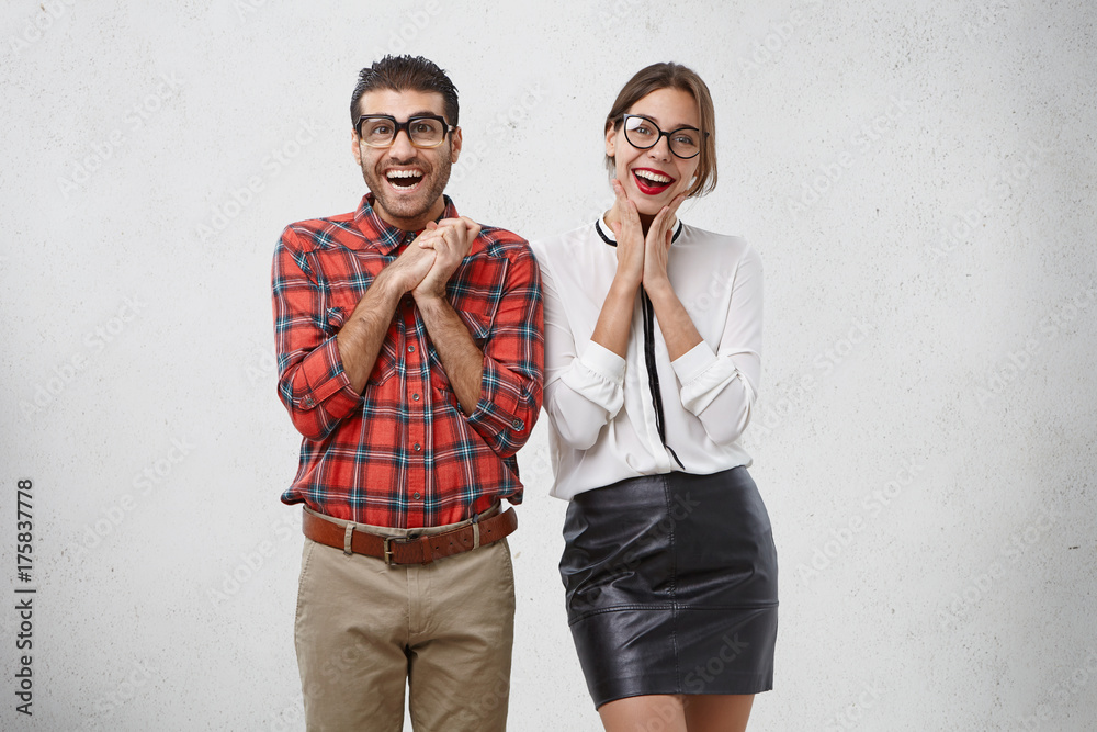 Joyful successful business people in formal clothes rejoice increasing ...