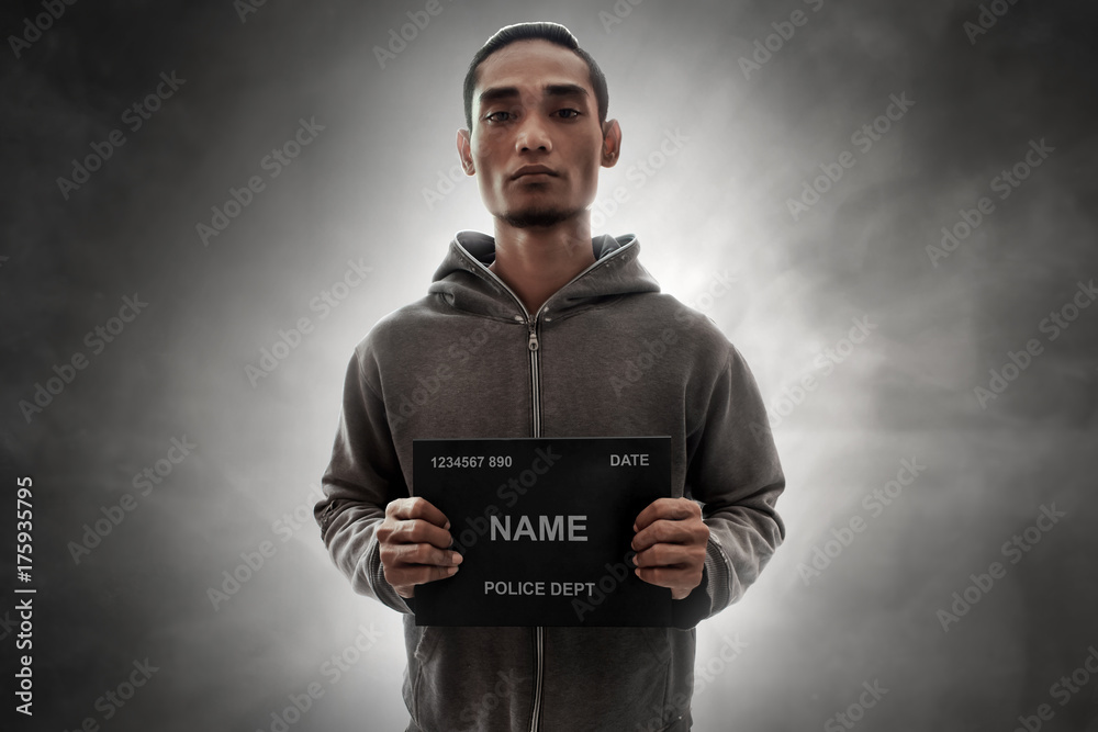 Mugshot of criminal Stock Photo | Adobe Stock