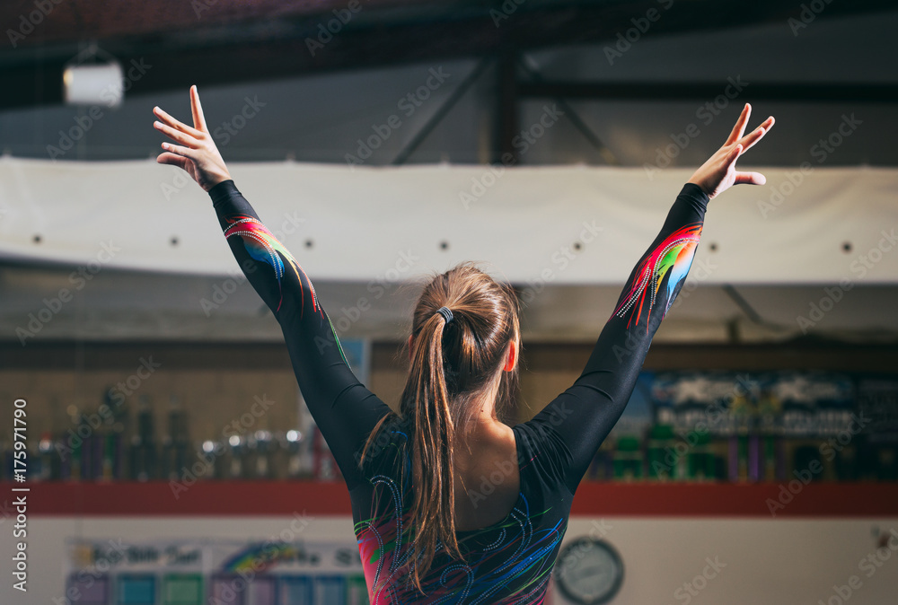 Gymnastics: Gymnast Strikes A Pose At Finish Of Routine Stock Photo ...