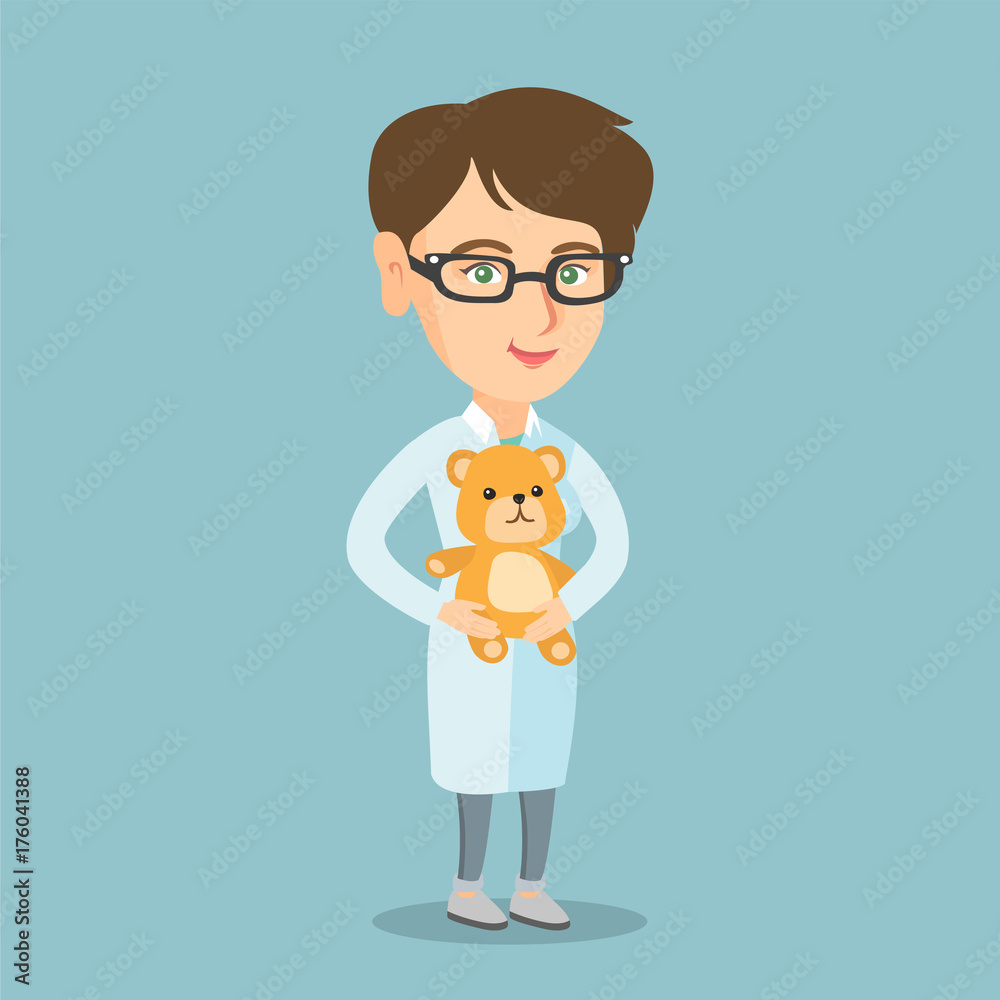 Caucasian pediatrician doctor in medical gown holding a teddy bear ...