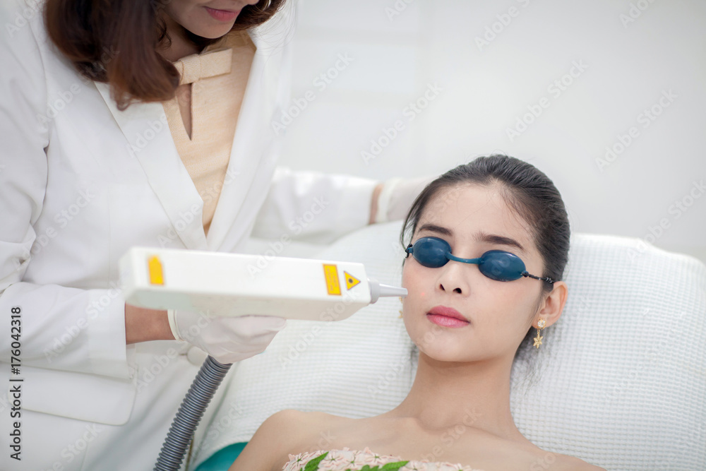 Face Care. Facial Laser Hair Removal. Beautician Giving Laser Epilation ...