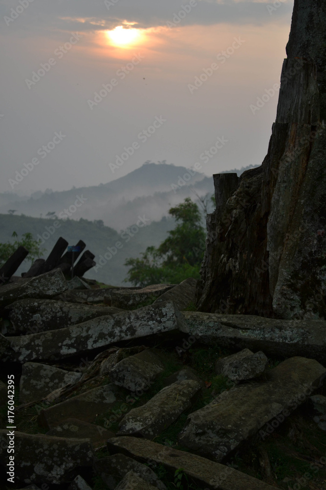 Sunrise at the megalithic site in West Java, Indonesia. It has ...